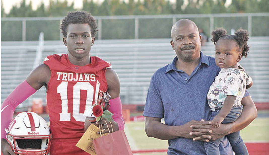 Trojans celebrate seniors with football victory - Riverbend News